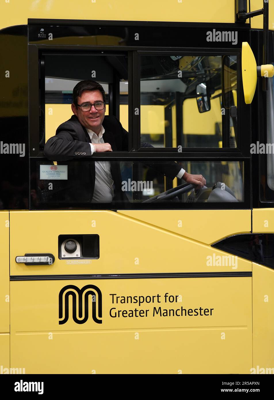 Greater Manchester mayor Andy Burnham views the 'Bee Network' buses at ...