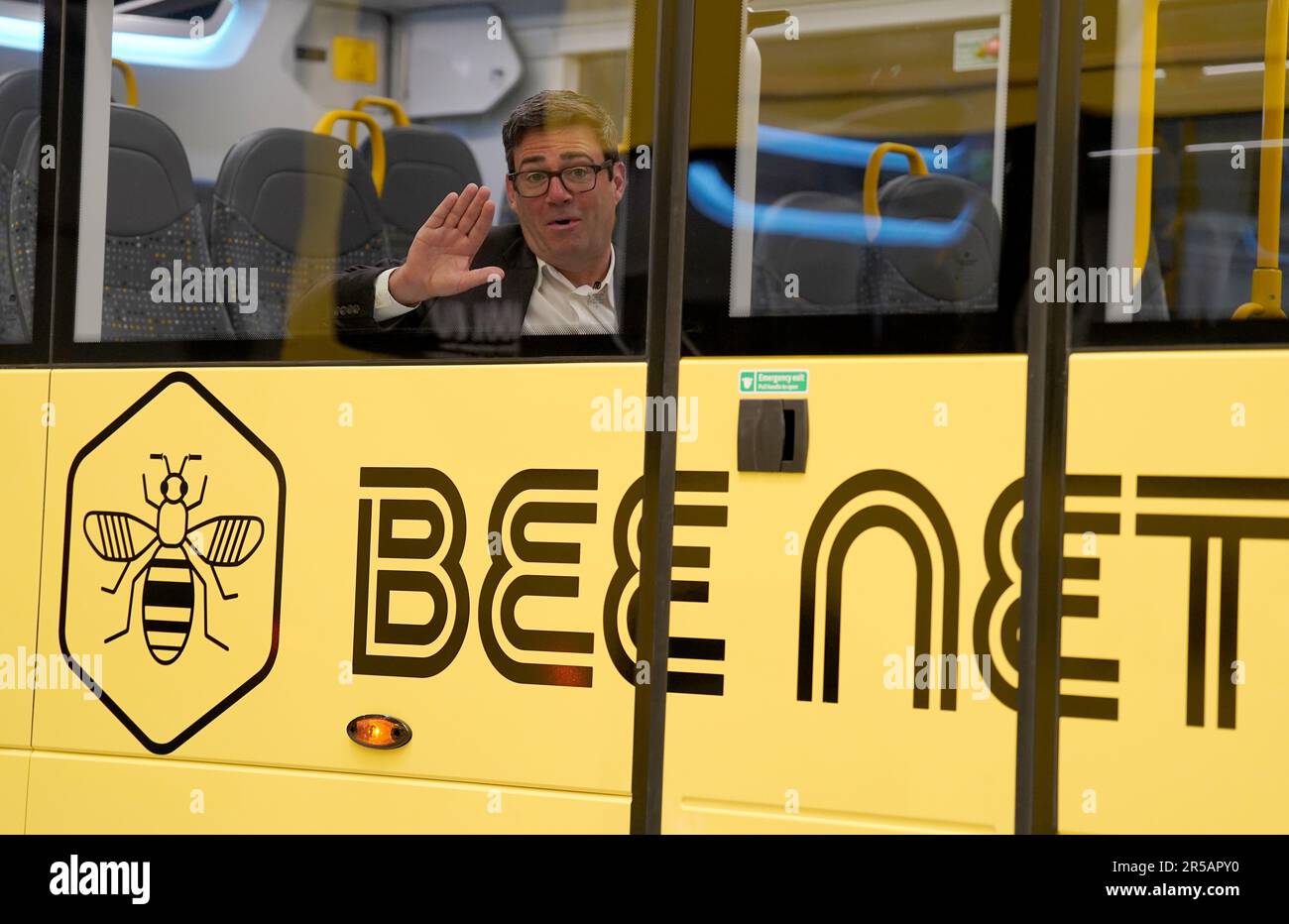 Greater Manchester mayor Andy Burnham views the 'Bee Network' buses at ...