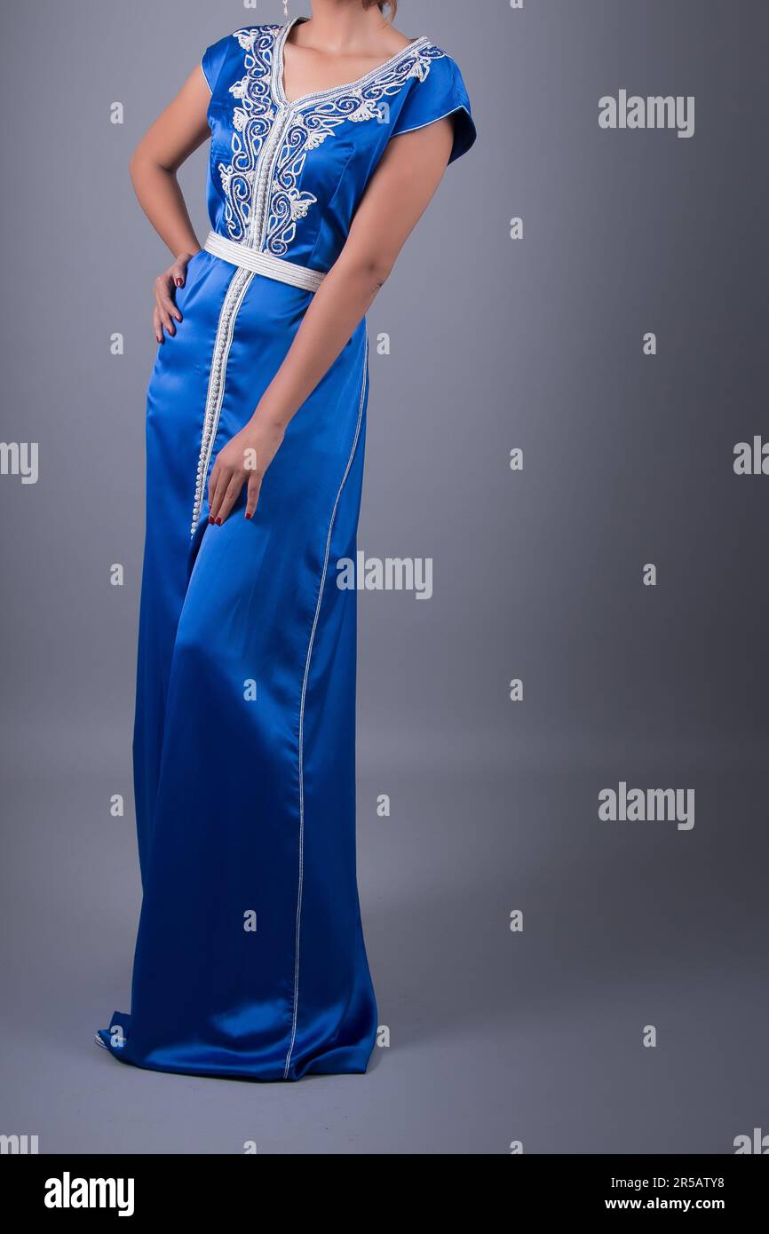 Tradition Meets Fashion: Model in Moroccan Caftan Stock Photo - Alamy