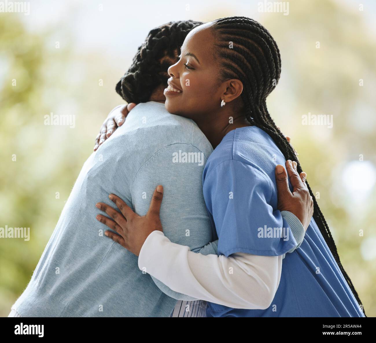 Woman patient, nurse and hug outdoor for support, healthcare and ...