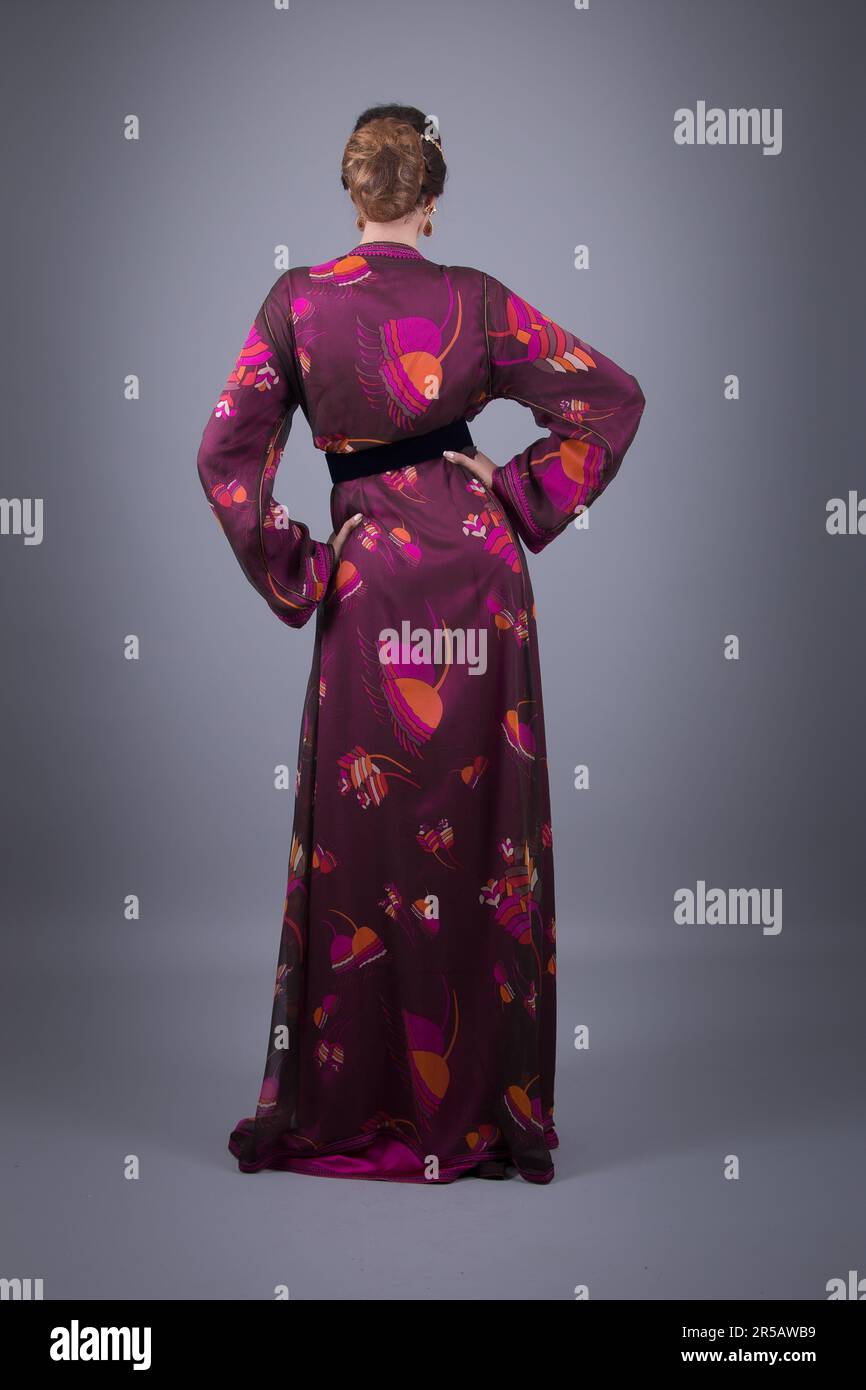 Showcasing Moroccan Fashion: Model in a Traditional Caftan Stock Photo ...