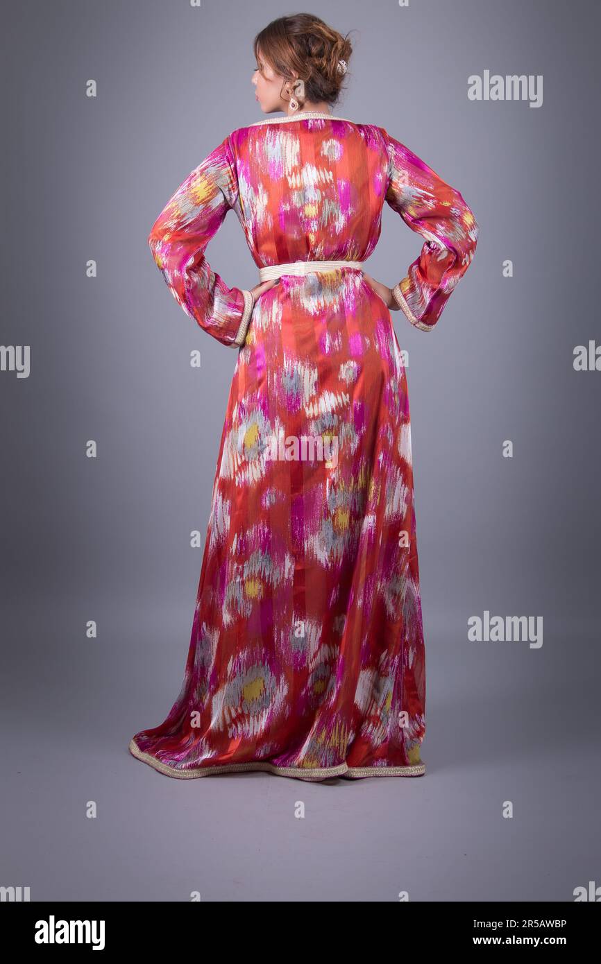 Elegance Defined: Woman Modeling a Moroccan Kaftan Stock Photo - Alamy