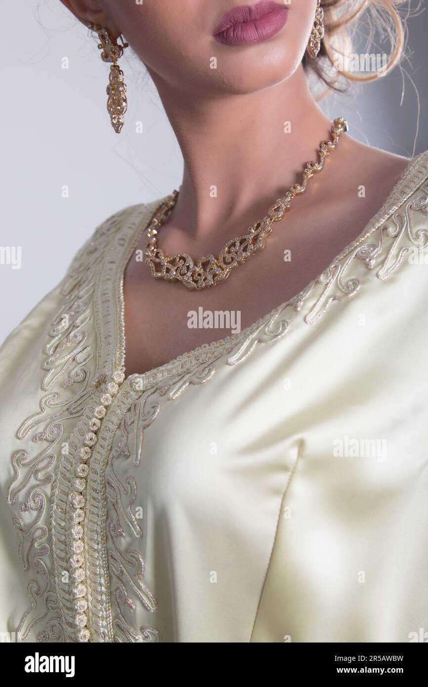 Elegance Defined: Woman Modeling a Moroccan Kaftan Stock Photo - Alamy