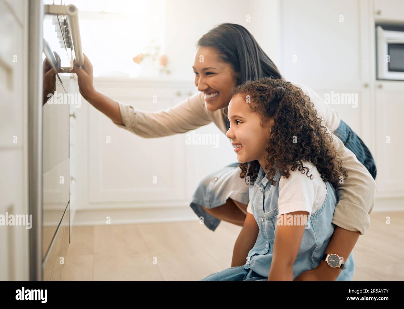 Mother, oven or child baking in kitchen as a happy family with young ...