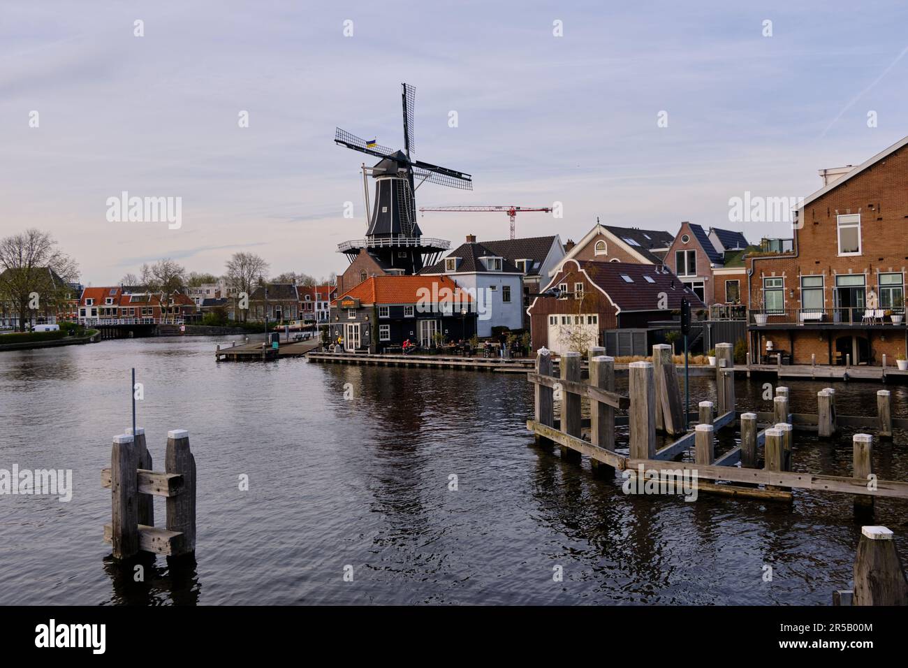 De Adriaan windmill. Located on the banks of the river Spaarne Stock ...
