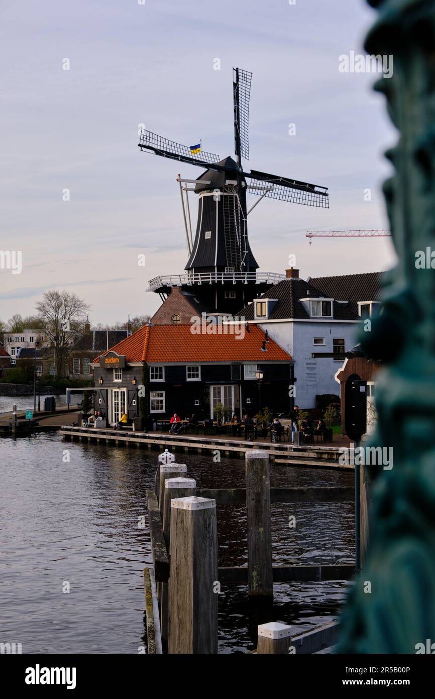 De Adriaan windmill. Located on the banks of the river Spaarne Stock ...