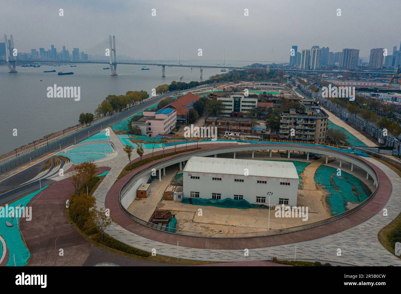 An aerial view of a bustling metropolitan area featuring a sprawling ...