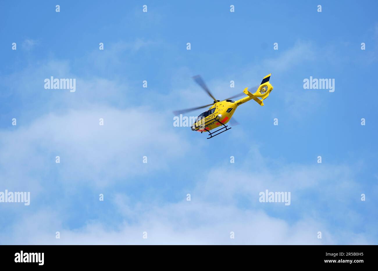 A National Grid helicopter flies over Lower Hamworthy in Dorset as it ...