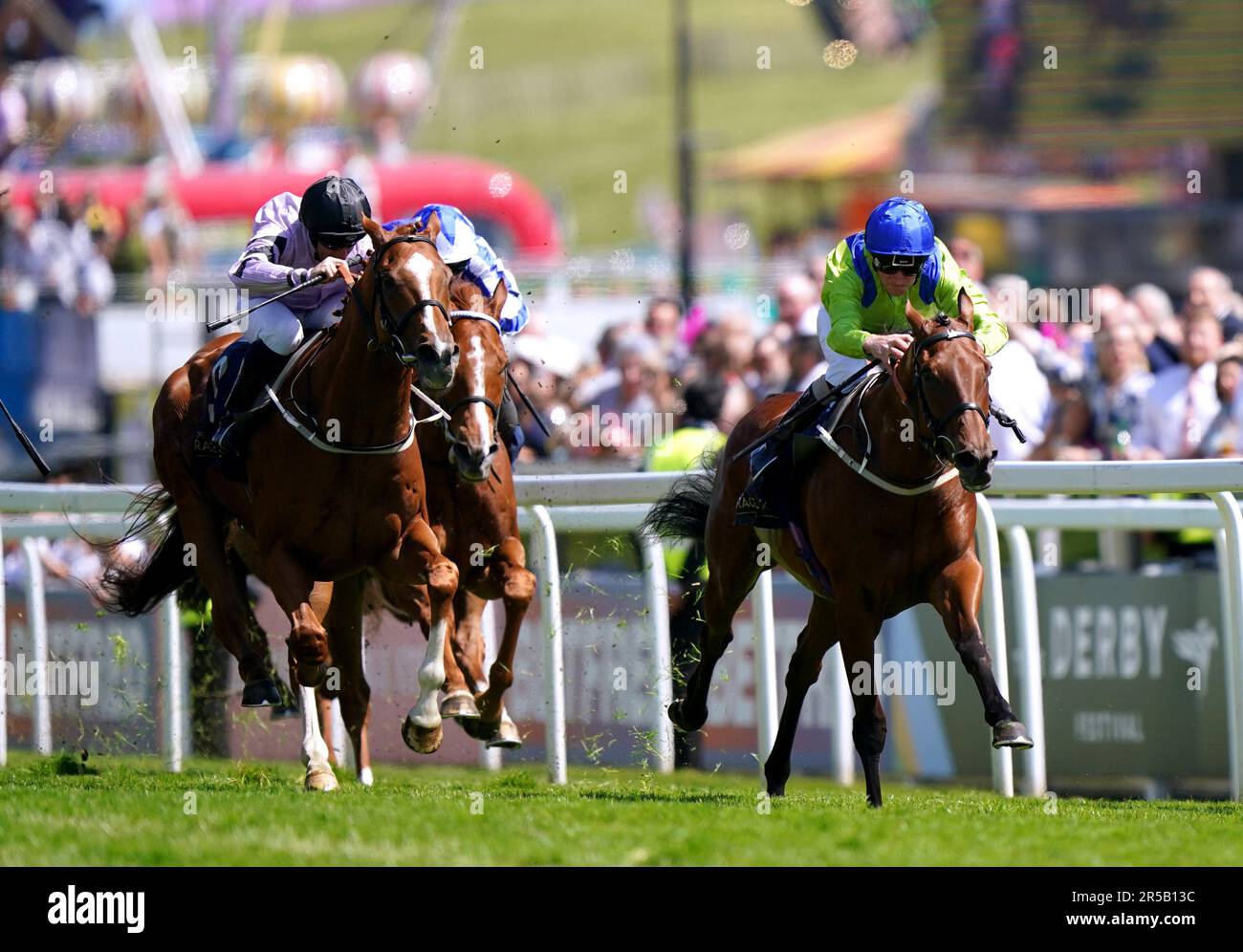 Austrian Theory ridden by jockey Joe Fanning (right) wins the Racehorse ...