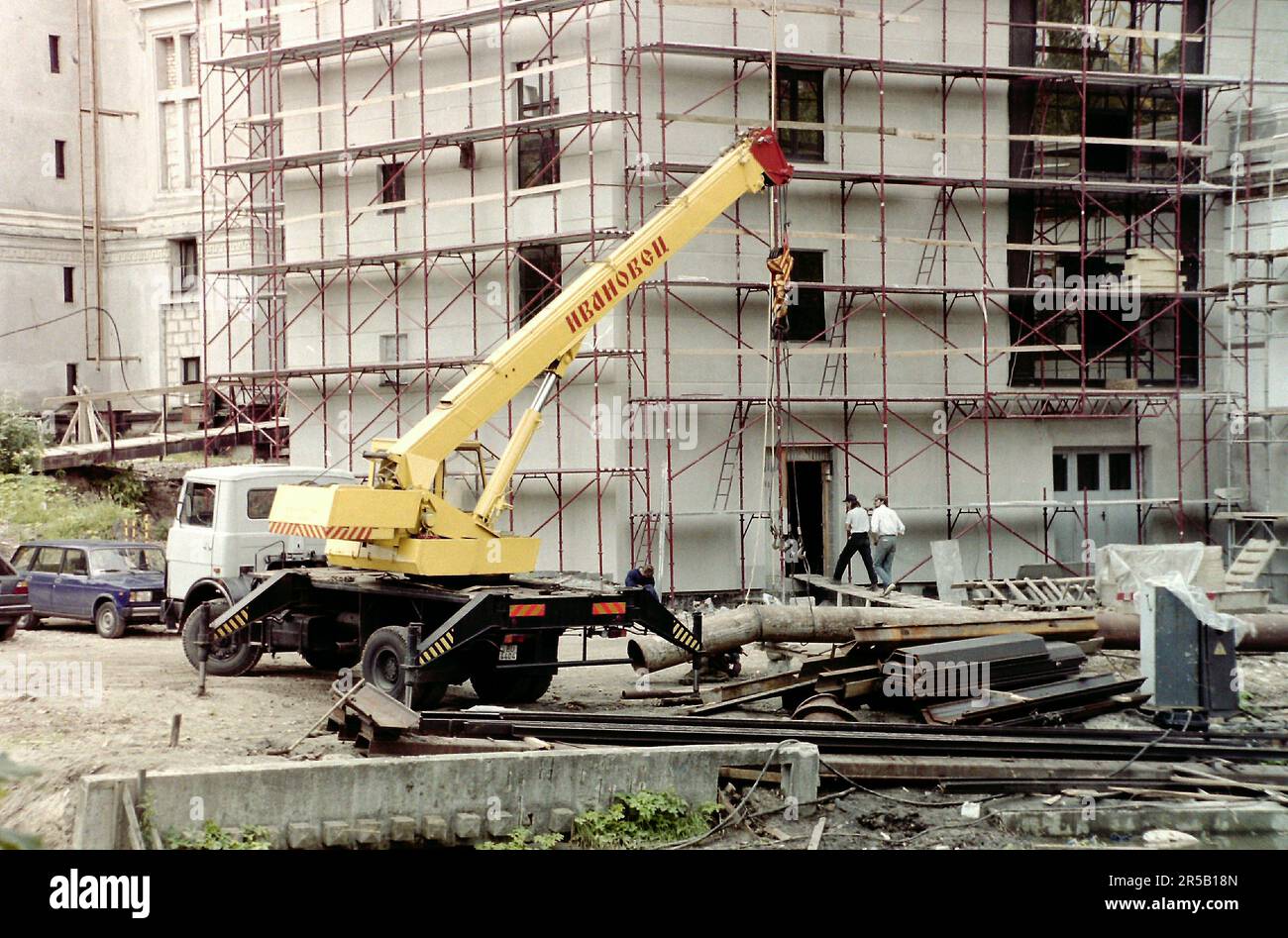 Renovation in Riga. Truck crane "Ivanovets" (photo 07.2001 Stock Photo ...