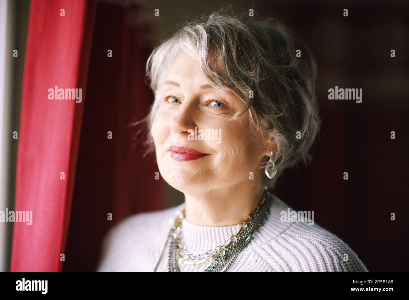 Close Up Portrait Of Beautiful 50 55 Year Old Woman With Grey Hair