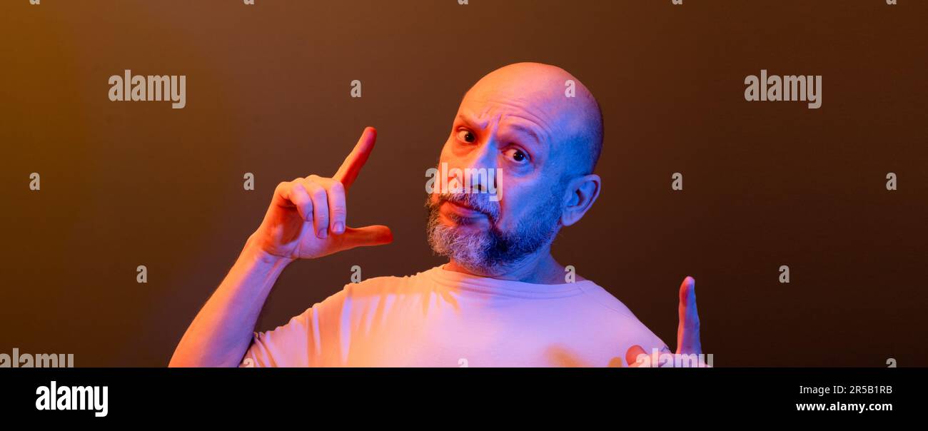 Happy Bald Bearded Man Making Funny Hand Gestures Concept Of Strength