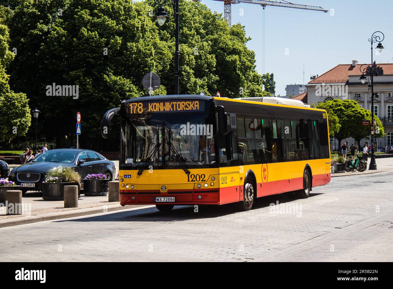 Warsaw, Poland - May 28, 2023 Bus driving in the streets of Warsaw and ...