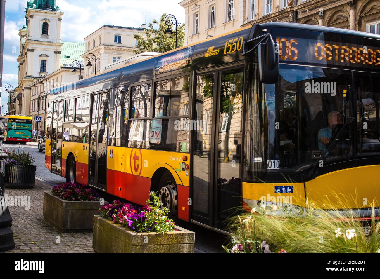 Warsaw, Poland - May 28, 2023 Bus driving in the streets of Warsaw and ...