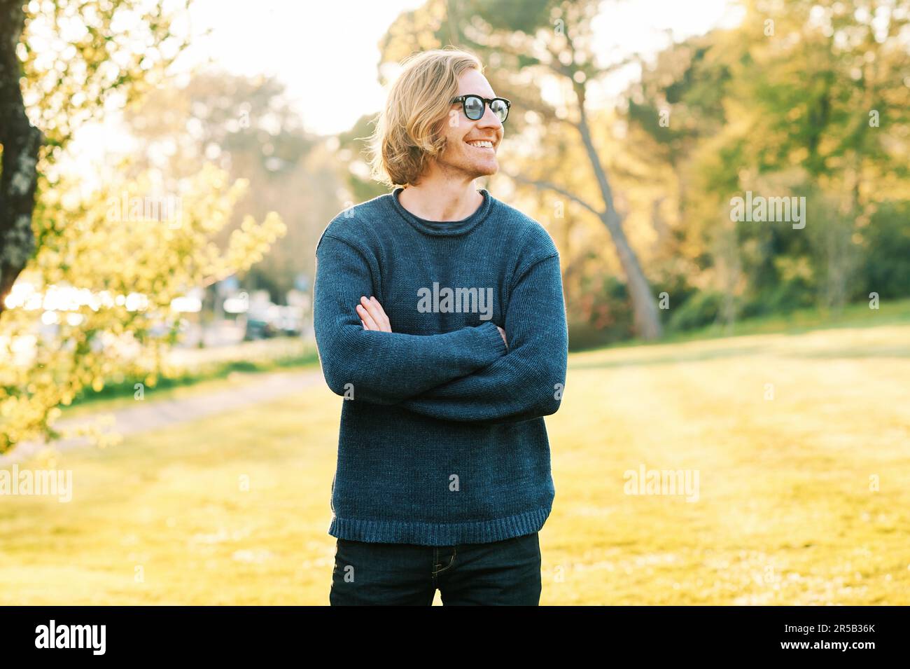 Outdoor portrait of handsome 35 - 40 year old man with red hair, posing ...