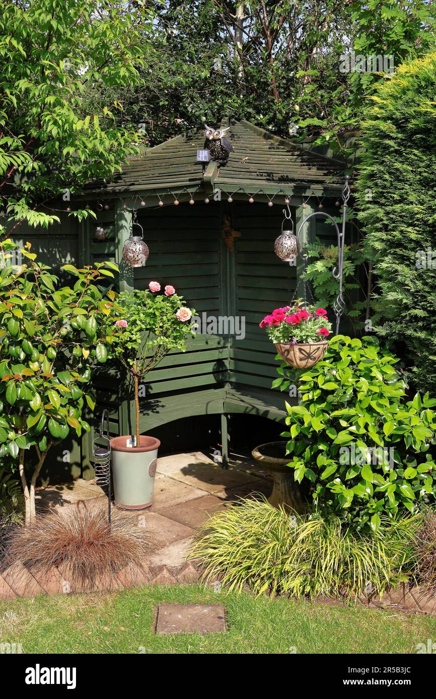 English back Garden with Gazebo, hanging basket, planter and foliage ...