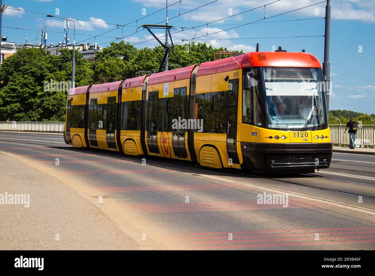 Warsaw, Poland - May 28, 2023 Electric tram driving in the streets of ...