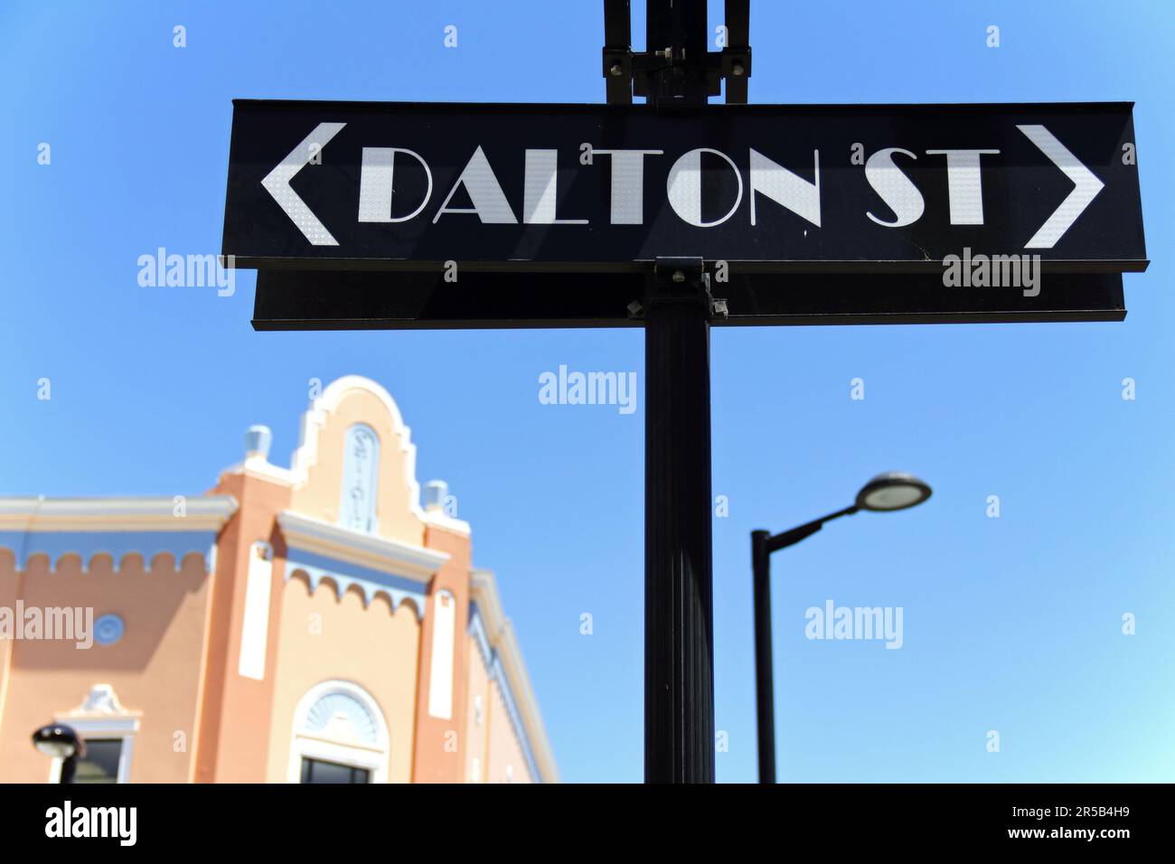 A close-up view of a black street sign in Napier. North Island, New ...