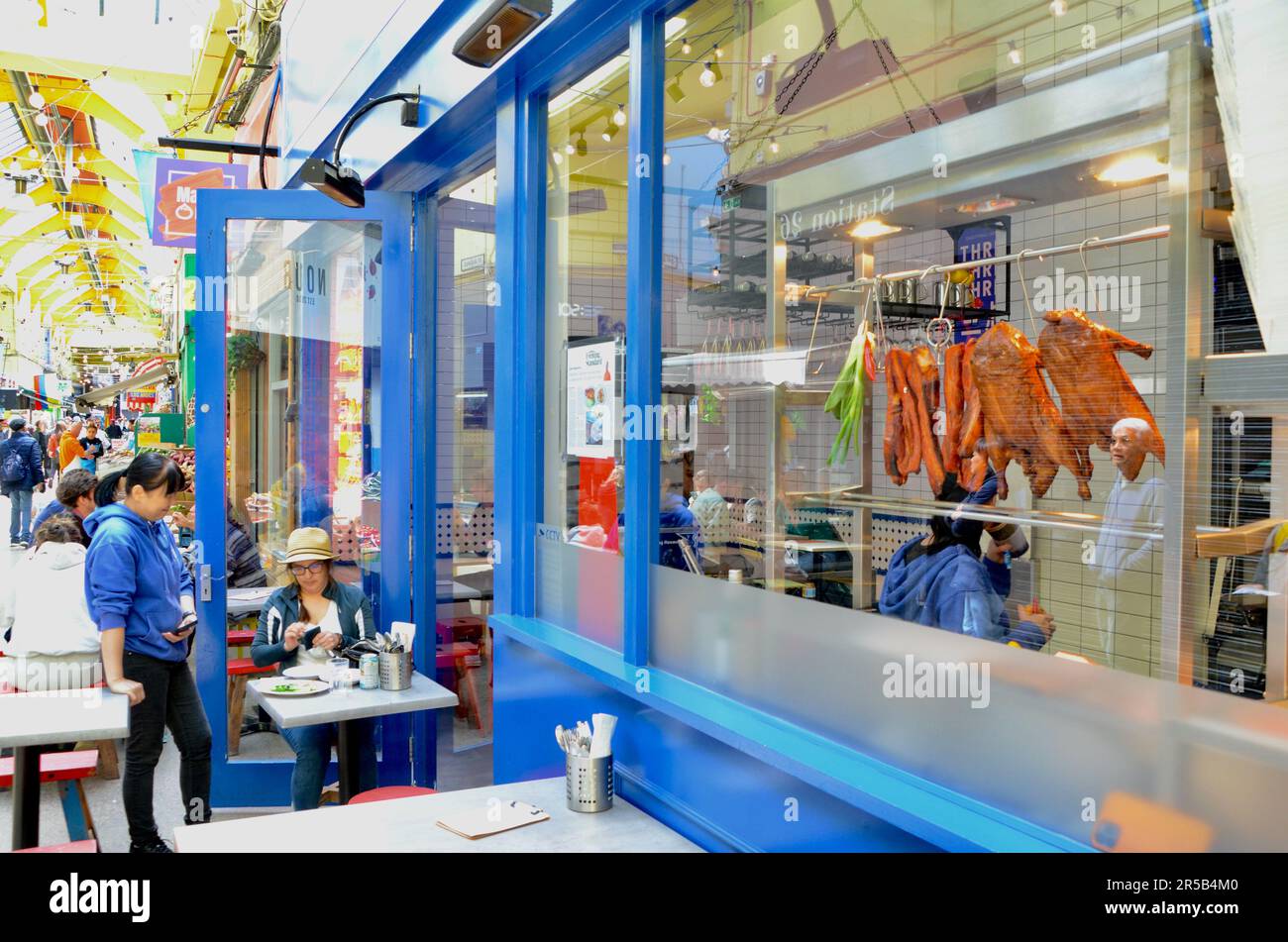 three uncles; brixton SW9 market with stalls shops restaurants bars etc ...