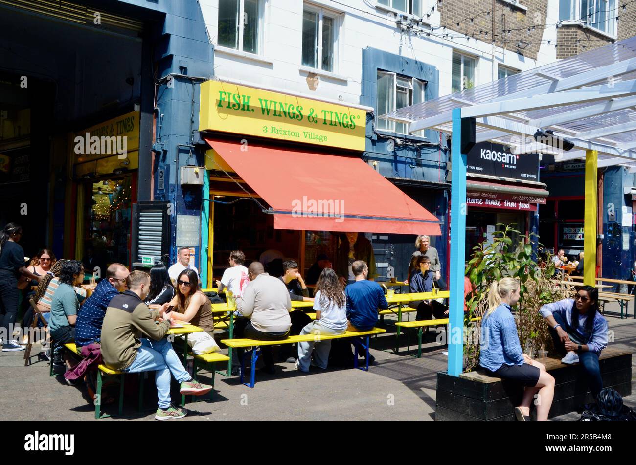fish wings and tings; brixton SW9 market with stalls shops restaurants ...