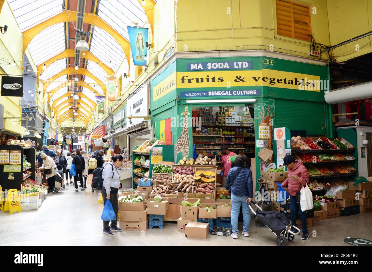 brixton SW9 market with stalls shops restaurants bars etc in arcade and ...