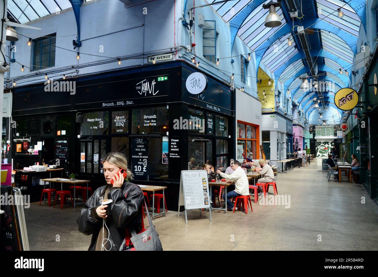 brixton SW9 market with stalls shops restaurants bars etc in arcade and ...