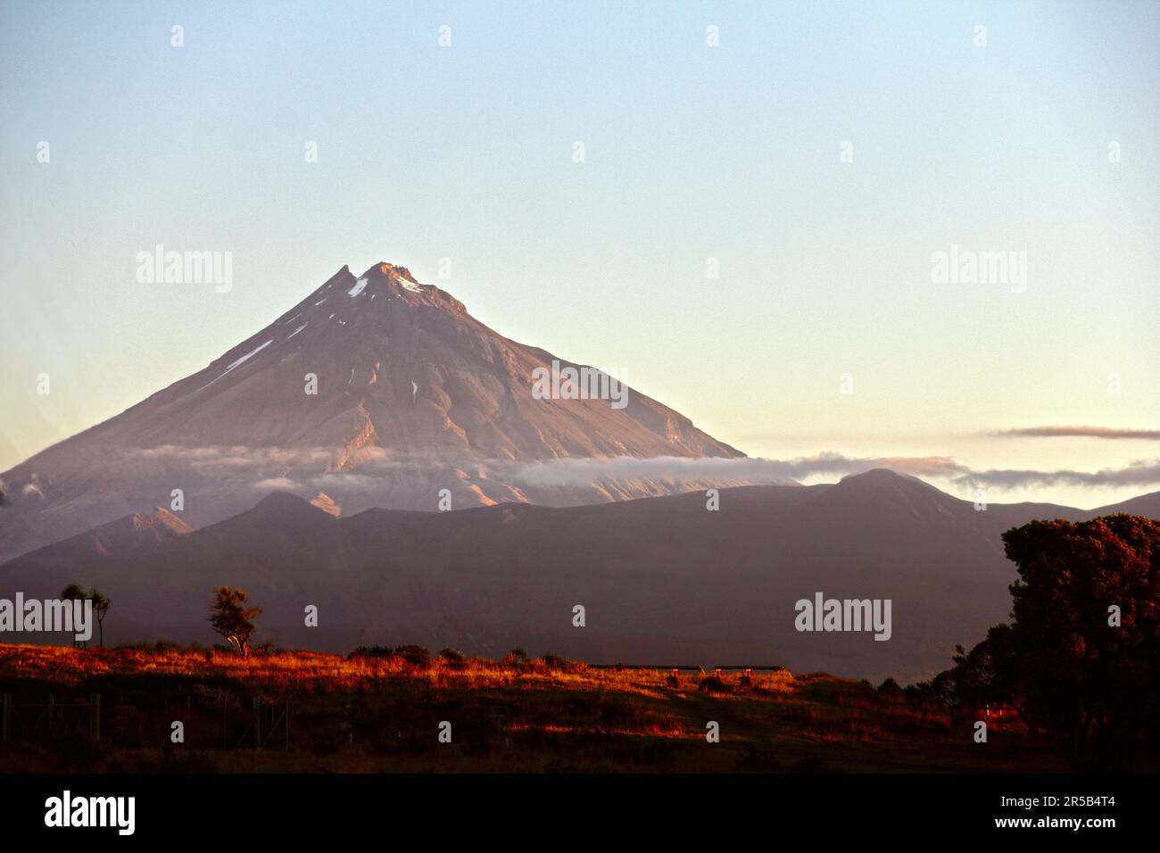 The view of Mount Taranaki at sunset. New Zealand Stock Photo - Alamy