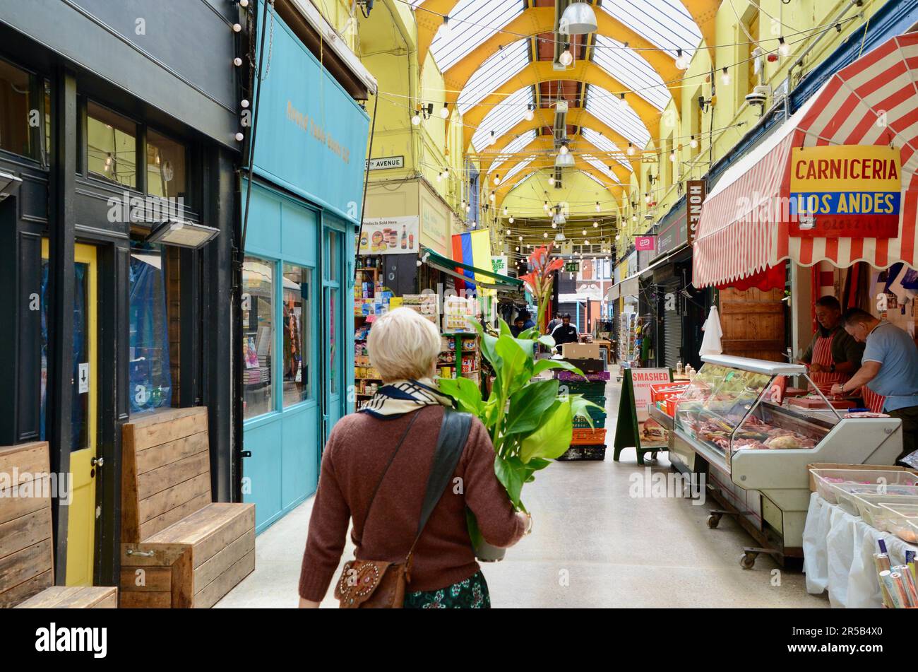 brixton SW9 market with stalls shops restaurants bars etc in arcade and ...