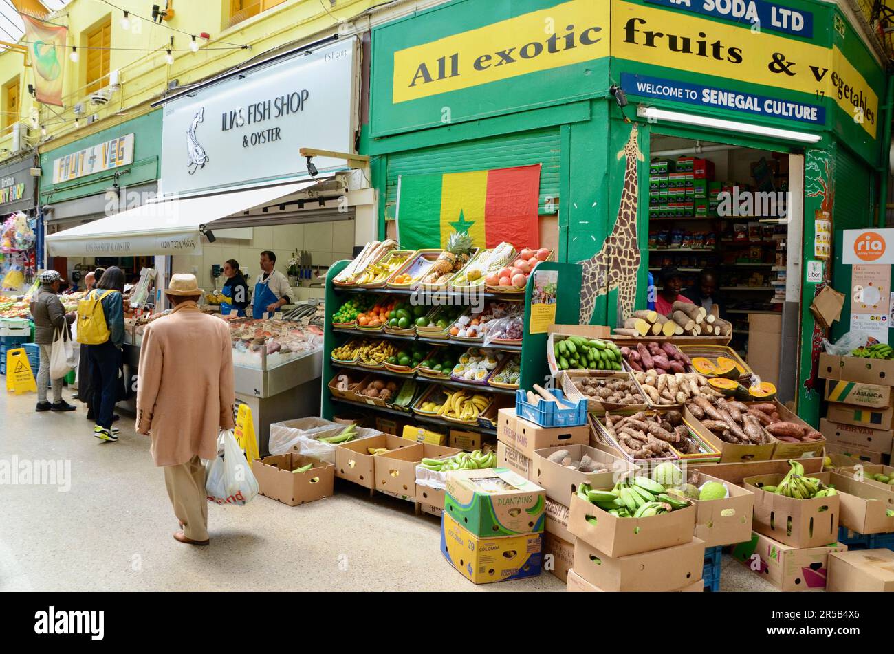 brixton SW9 market with stalls shops restaurants bars etc in arcade and ...