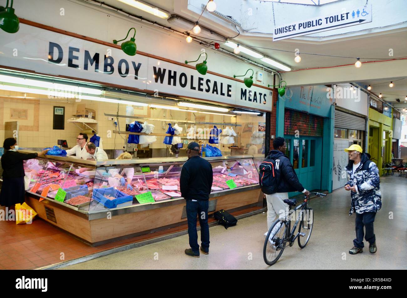 brixton SW9 market with stalls shops restaurants bars etc in arcade and ...