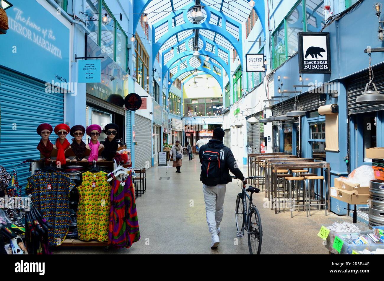 brixton SW9 market with stalls shops restaurants bars etc in arcade and ...