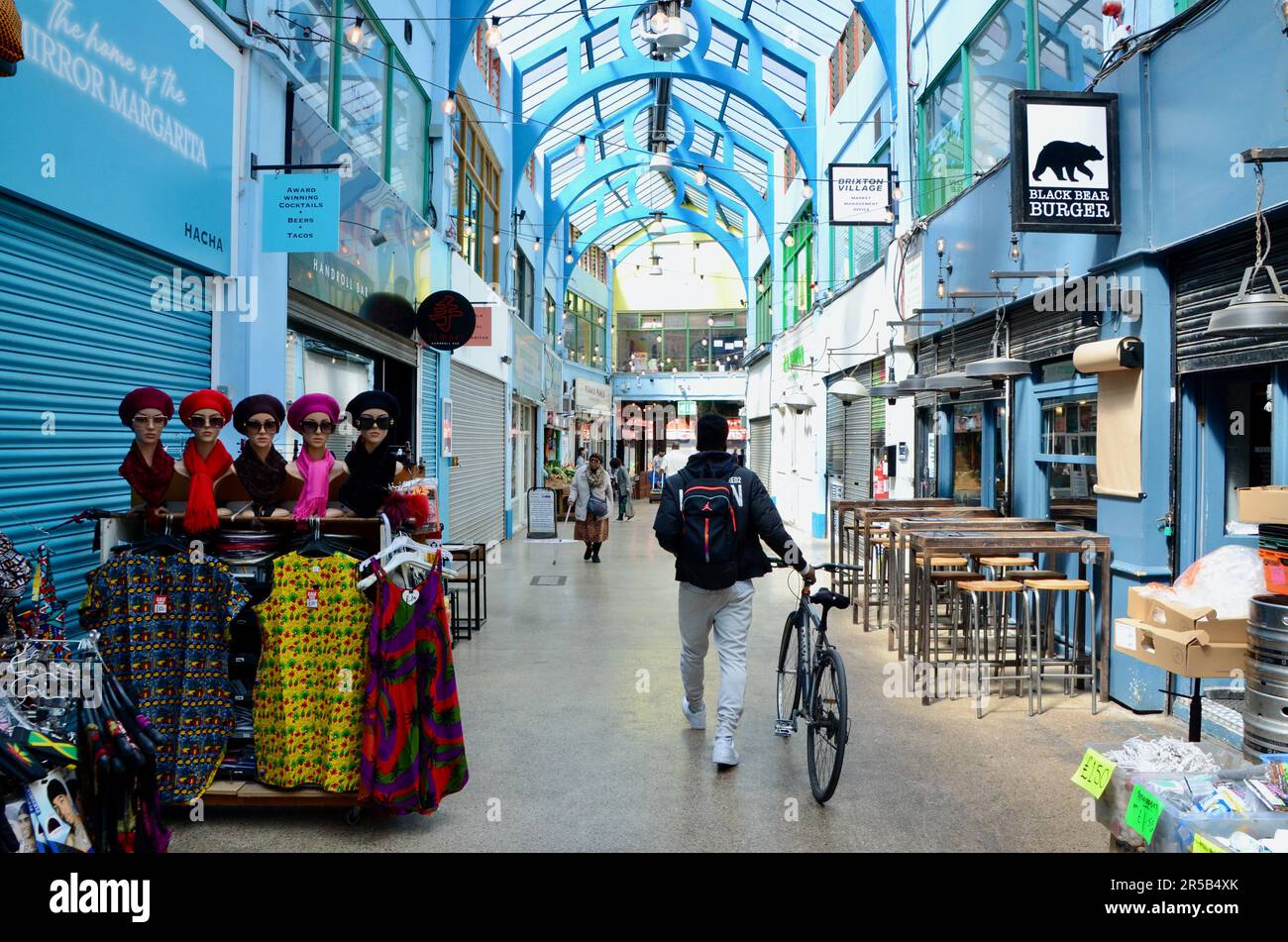 brixton SW9 market with stalls shops restaurants bars etc in arcade and ...
