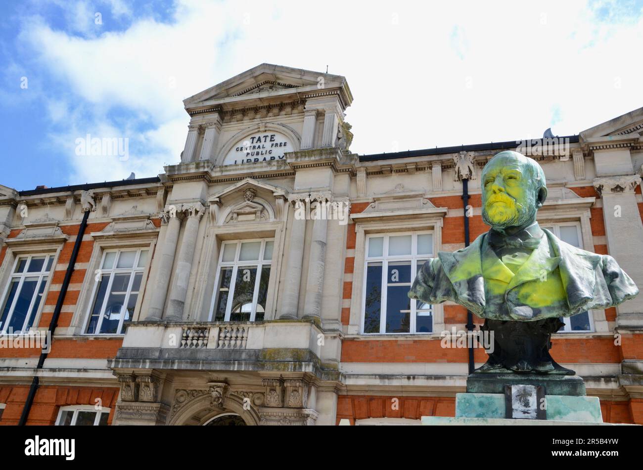 sir henry tate statue bust coloured yellow in brixton SW9 lambeth ...