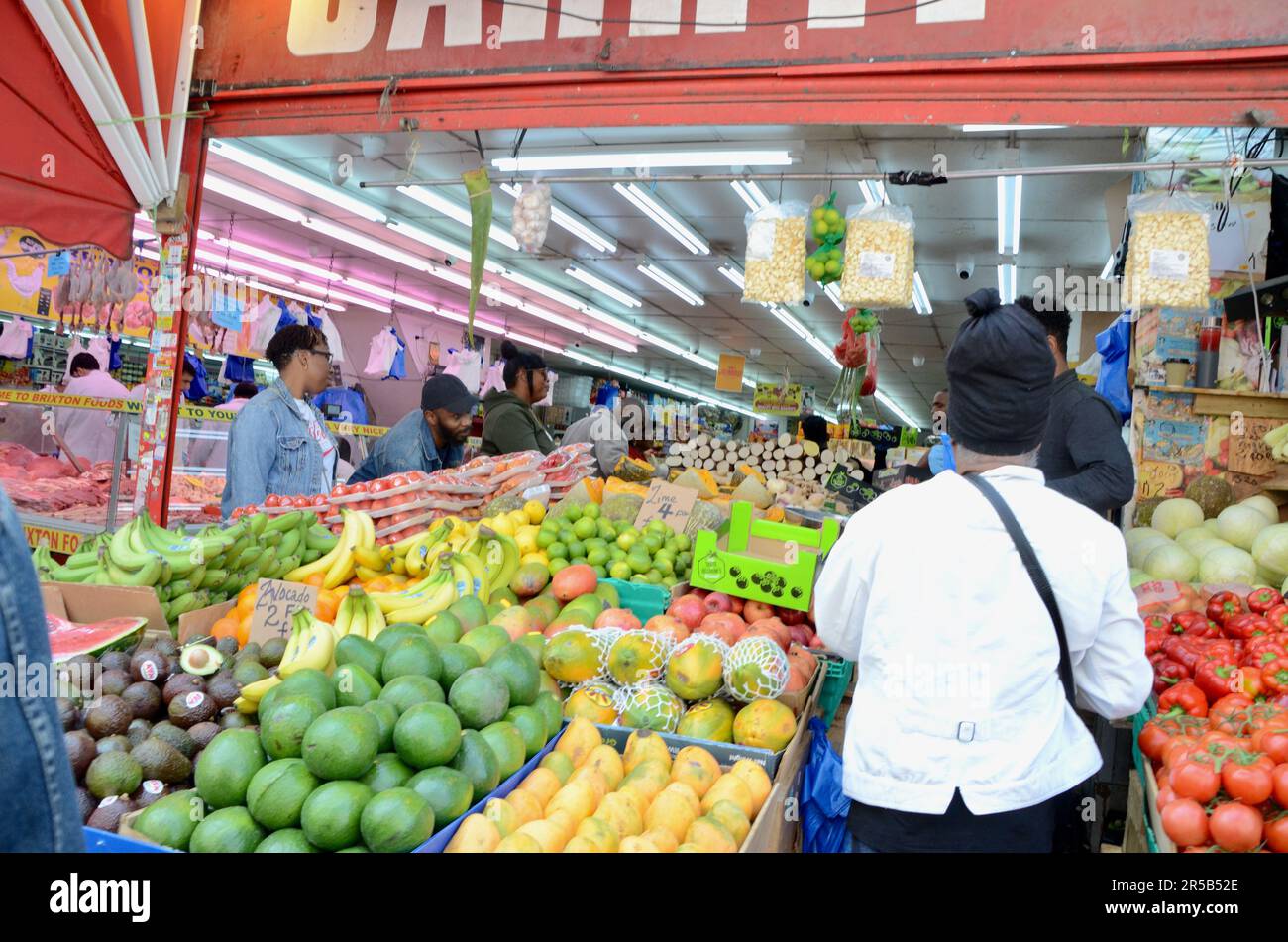 brixton SW9 market with stalls shops restaurants bars etc in arcade and ...