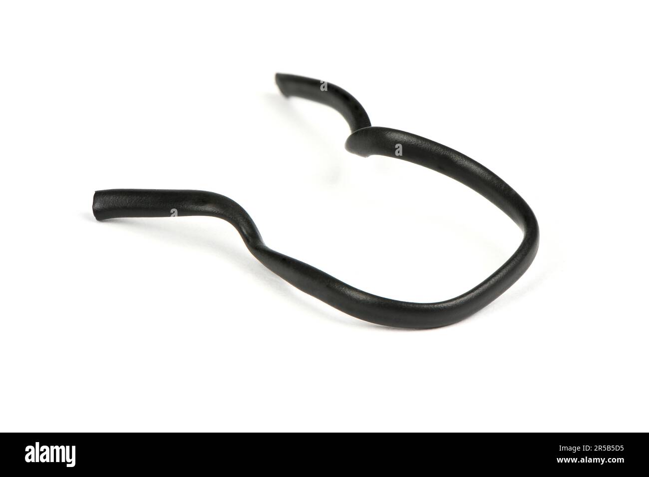 Black plastic coated wire tie used for a variety of things isolated on ...