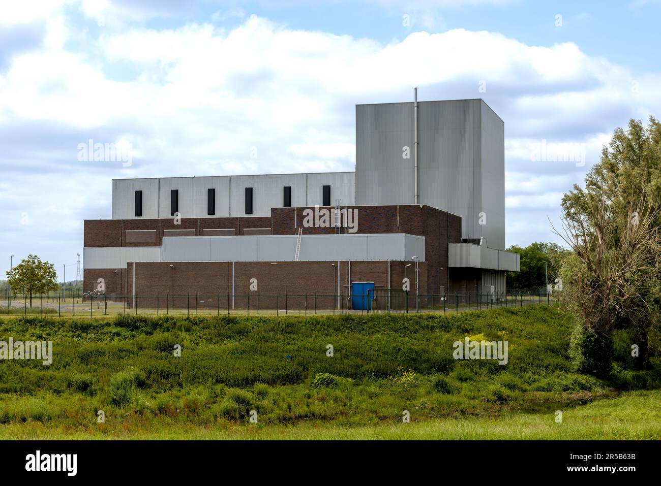 Netherlands, Dodewaard, 02-06-2023 - Exterior of the former nuclear ...