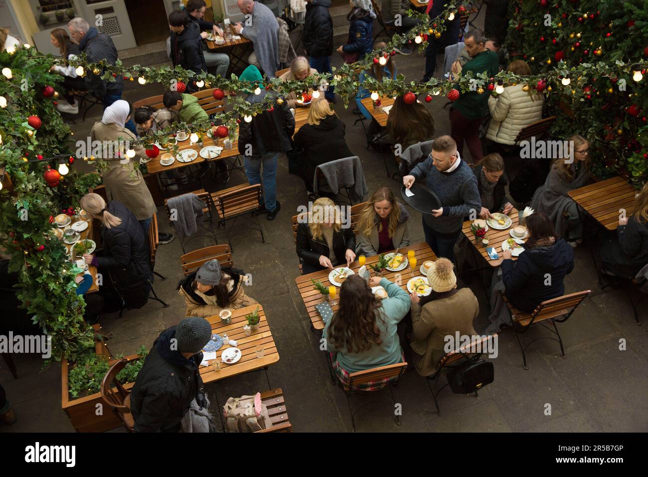 Christmassy decorations and outfits are seen in Covent Garden, central ...