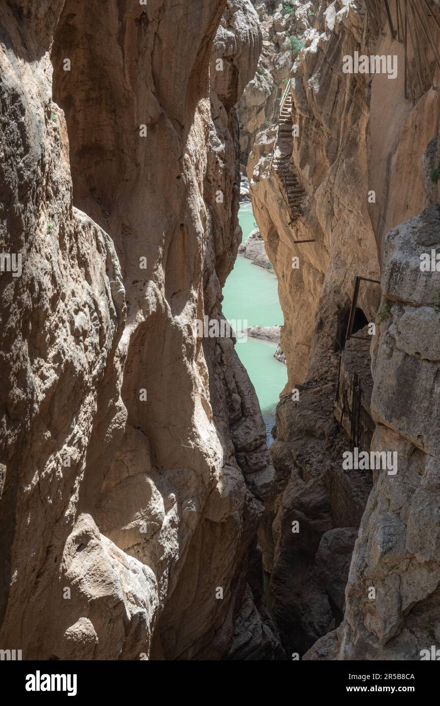 Perspective from above of canyon walls and river flow at the bottom of ...