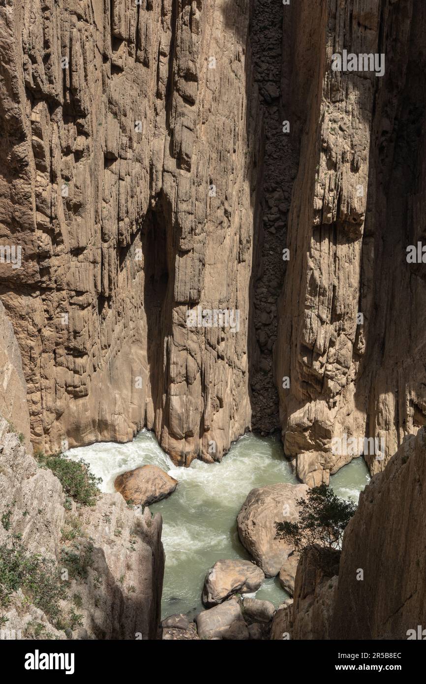 Perspective from above of canyon walls and river flow at the bottom of ...