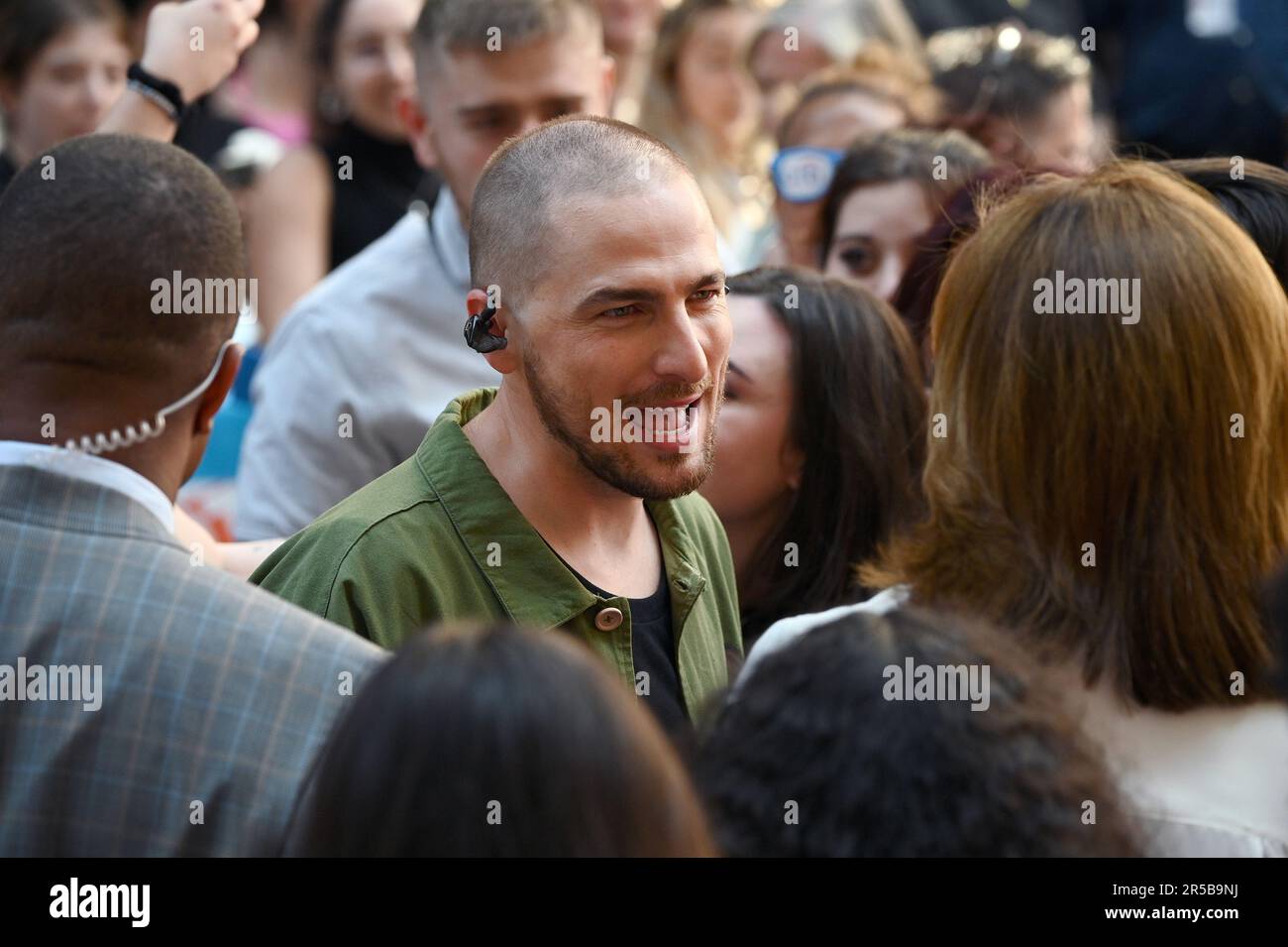 Carlos PenaVega of Big Time Rush signs autographs between performances ...