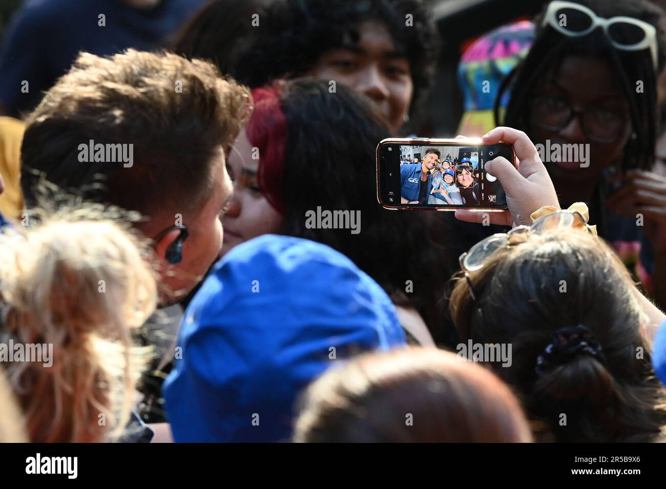 Logan Henderson of Big Time Rush poses with fans between songs on NBC’s ...