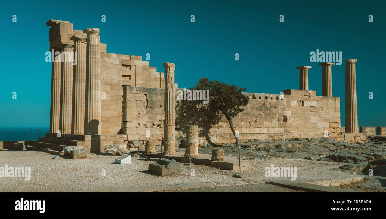 A scenic view of a historic cityscape featuring pillars and structures ...