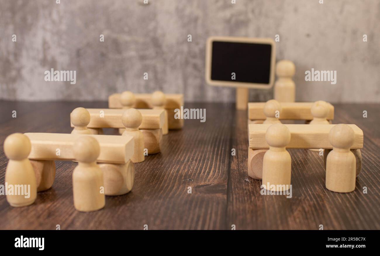 MANIKIN POINTING WITH A STICK TO AN EMPTY BLACKBOARD WITHOUT ...