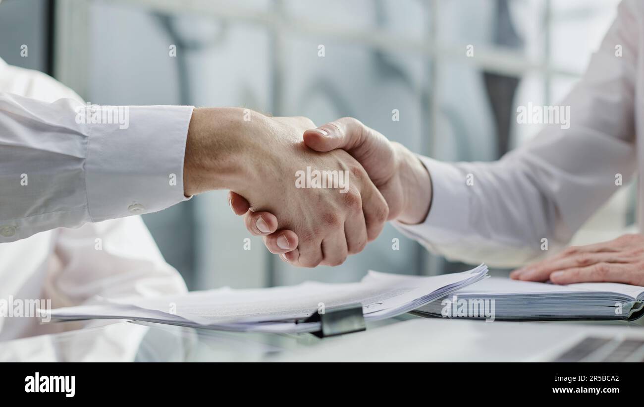 Handshake is symbol of starting finishing negotiations, successful ...
