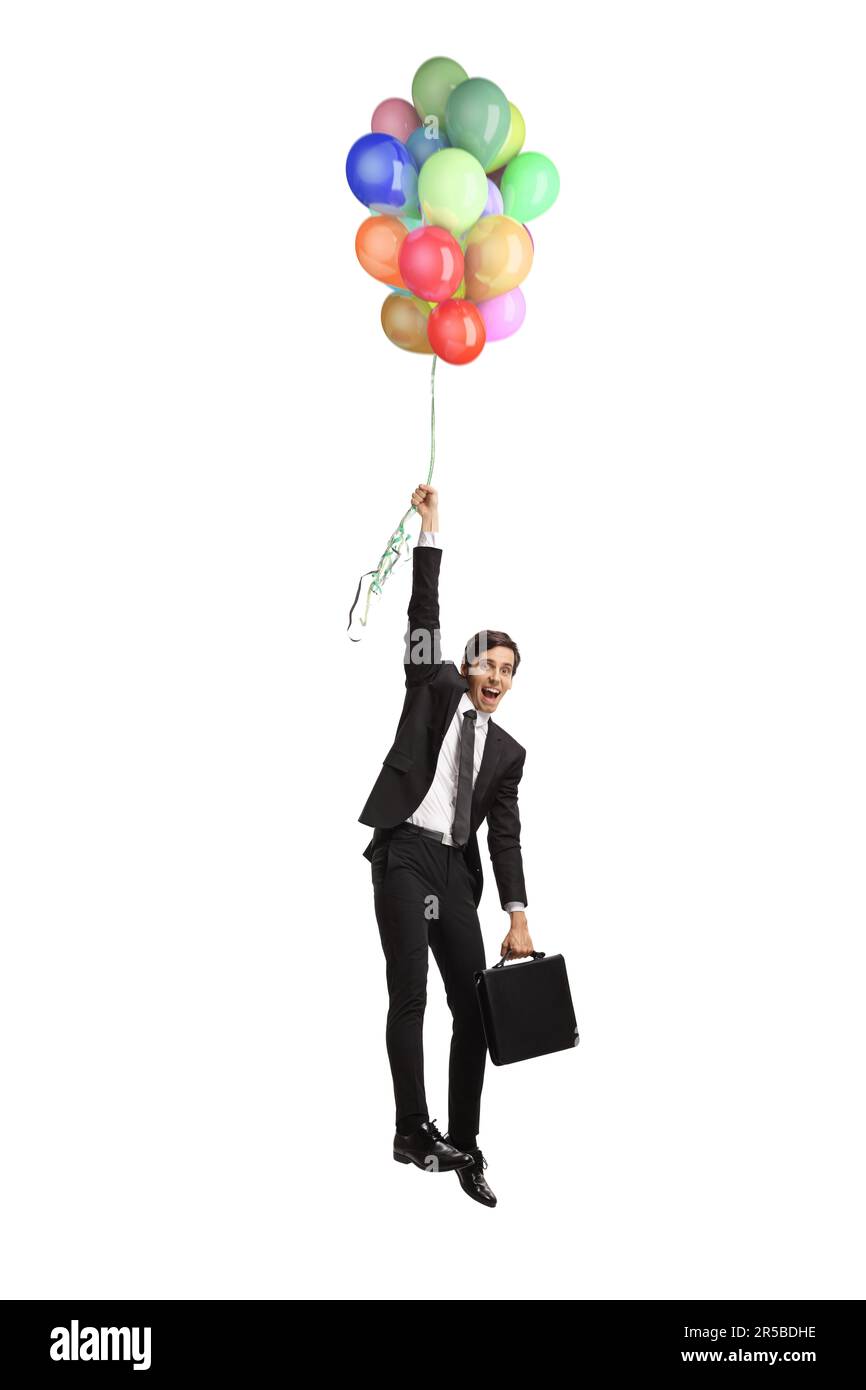 Businessman holding balloons and flying up isolated on white background ...