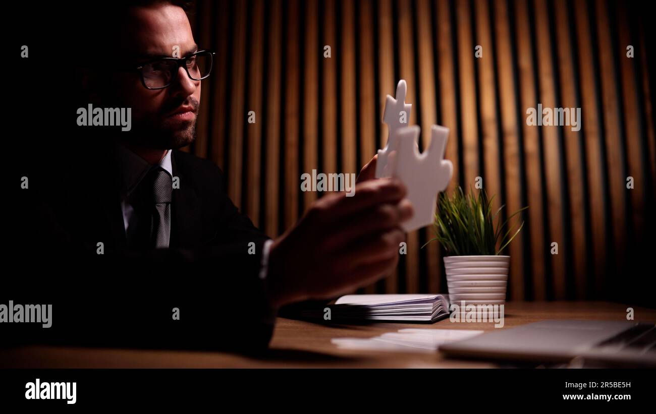 Attractive young guy is solving a problem Stock Photo - Alamy