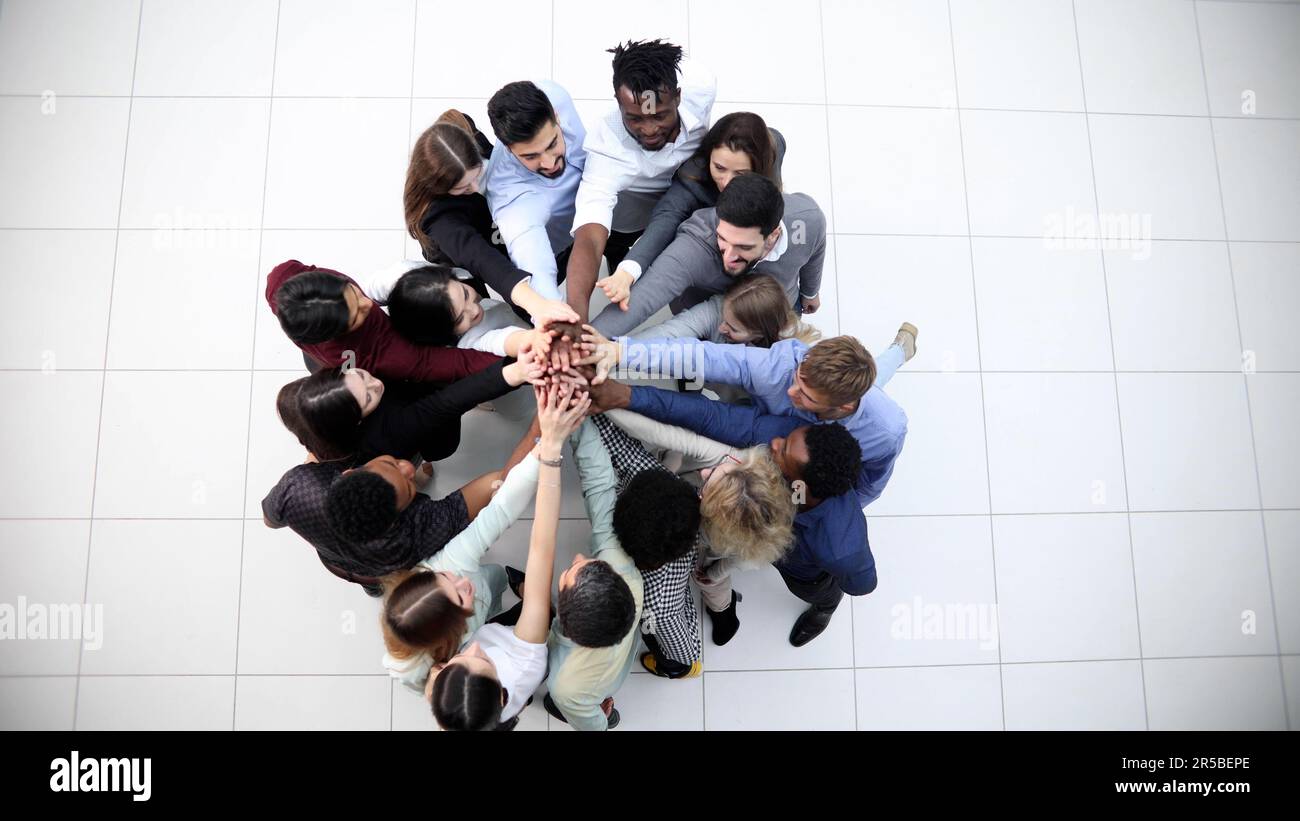 Business people stretched out their hands towards each other while ...