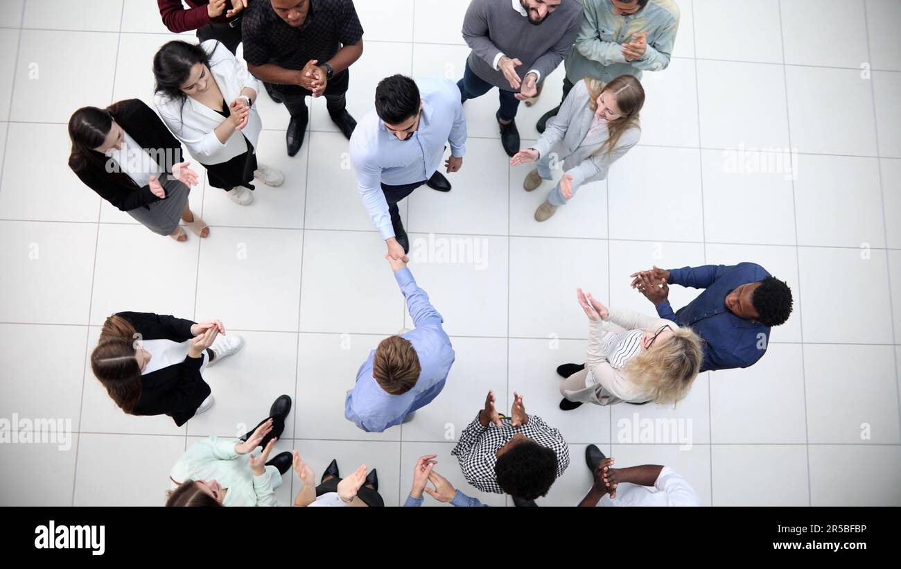 Office workers talking in lobby hi-res stock photography and images - Alamy