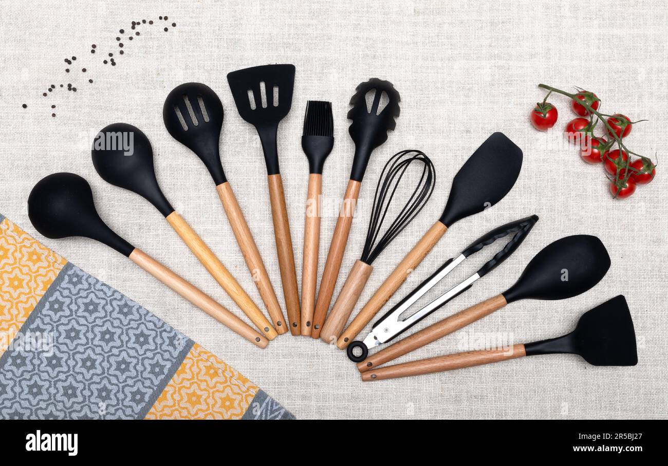 An overhead view of a kitchen countertop featuring an array of cooking ...