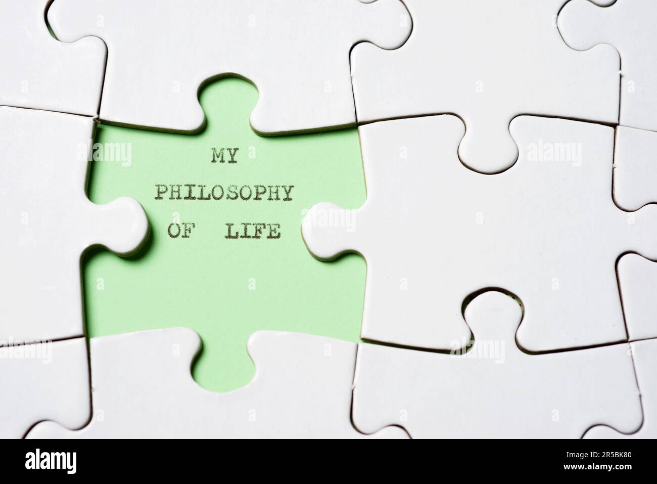 My philosophy of life text written with a typewriter in a white puzzle ...